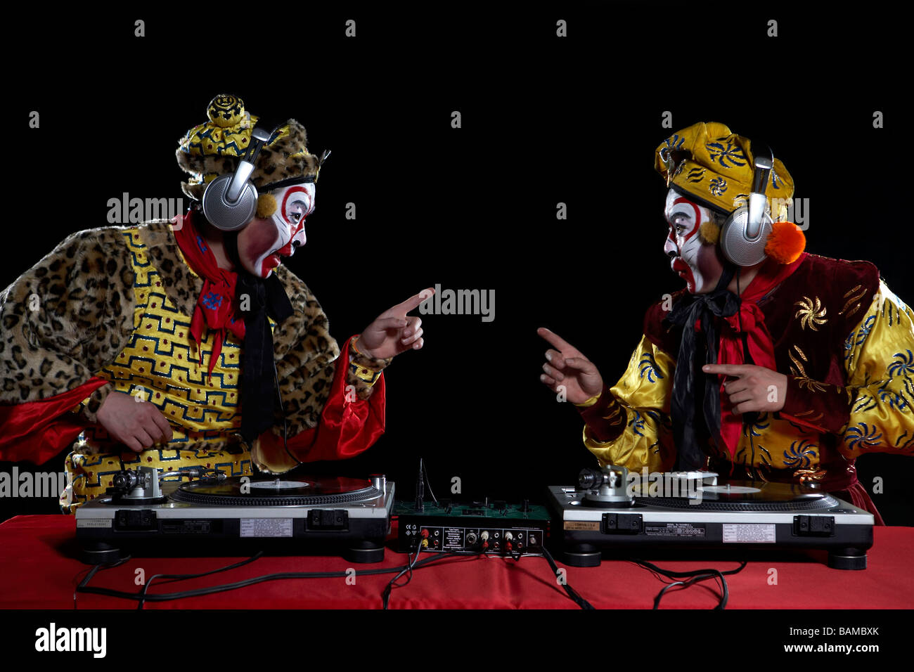 Men In Ceremonial Costume Using Turn-Tables Stock Photo - Alamy