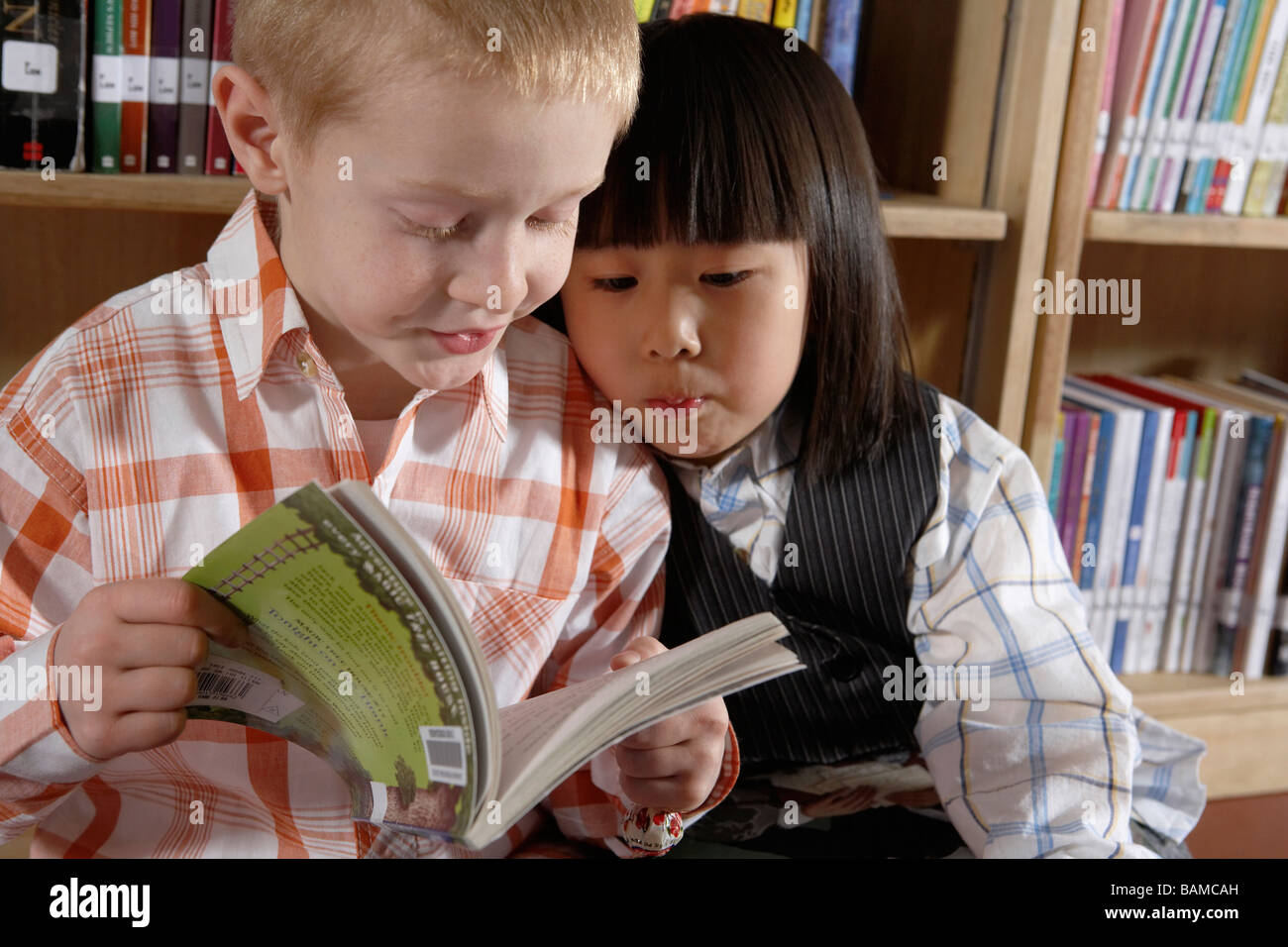 Children Reading Book Together Stock Photo - Alamy