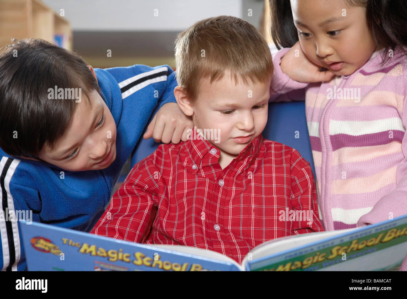 Children Reading Book Together Stock Photo - Alamy