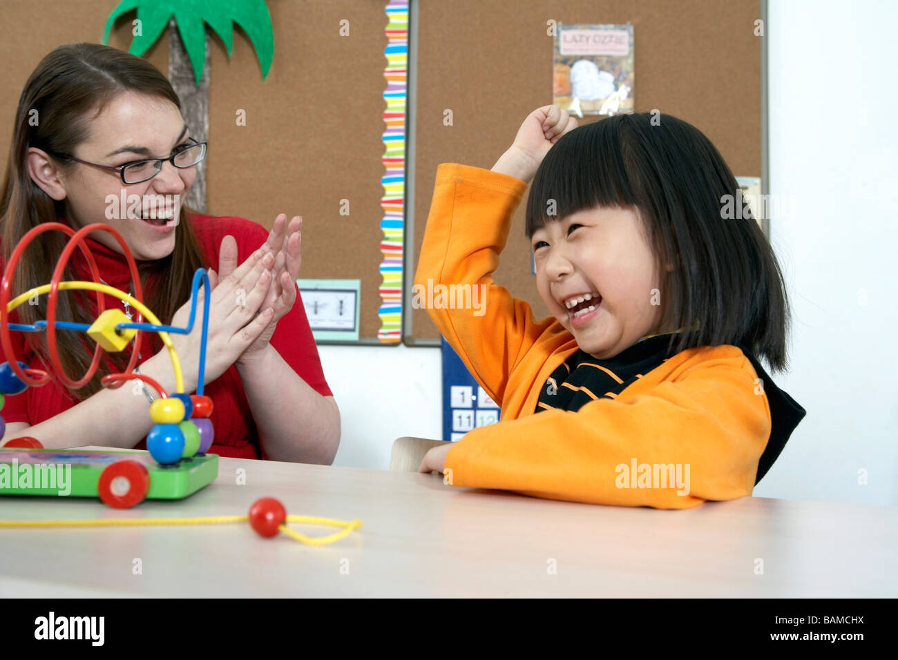 Elementary Teacher Clapping High Resolution Stock Photography and ...