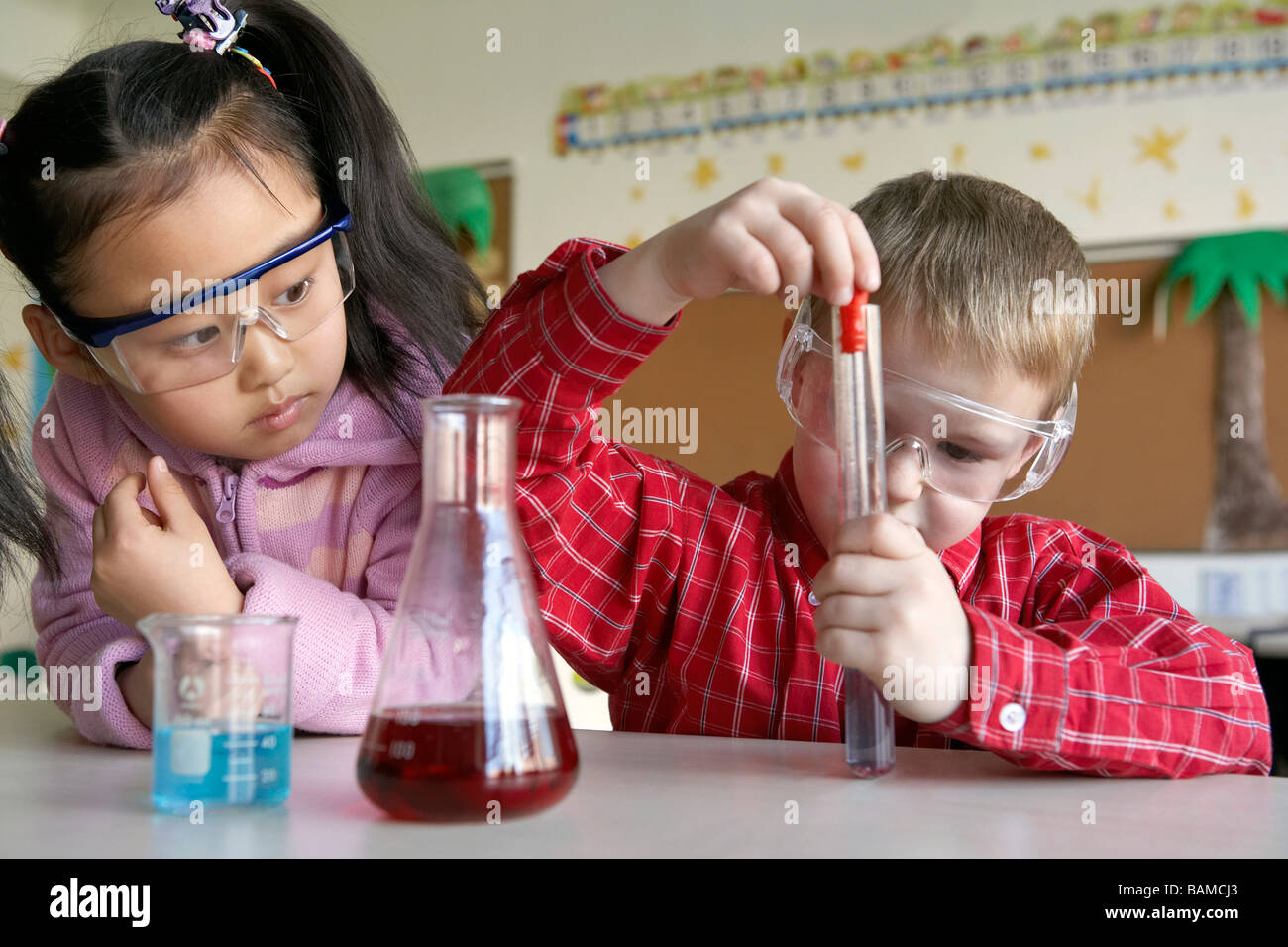 Children Looking At Test Tubes Stock Photo - Alamy
