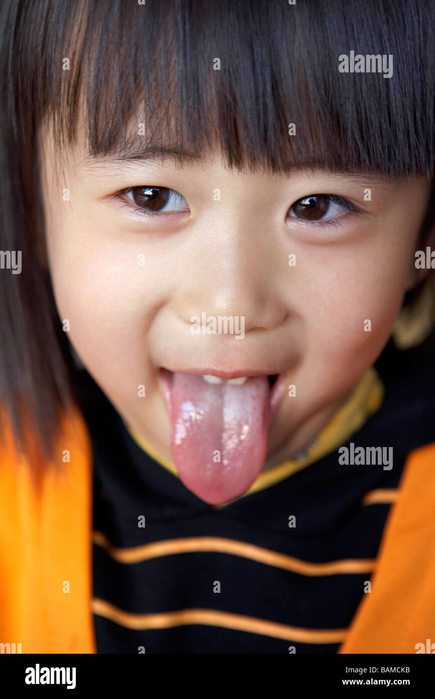 Child Poking Tongue High Resolution Stock Photography and Images - Alamy