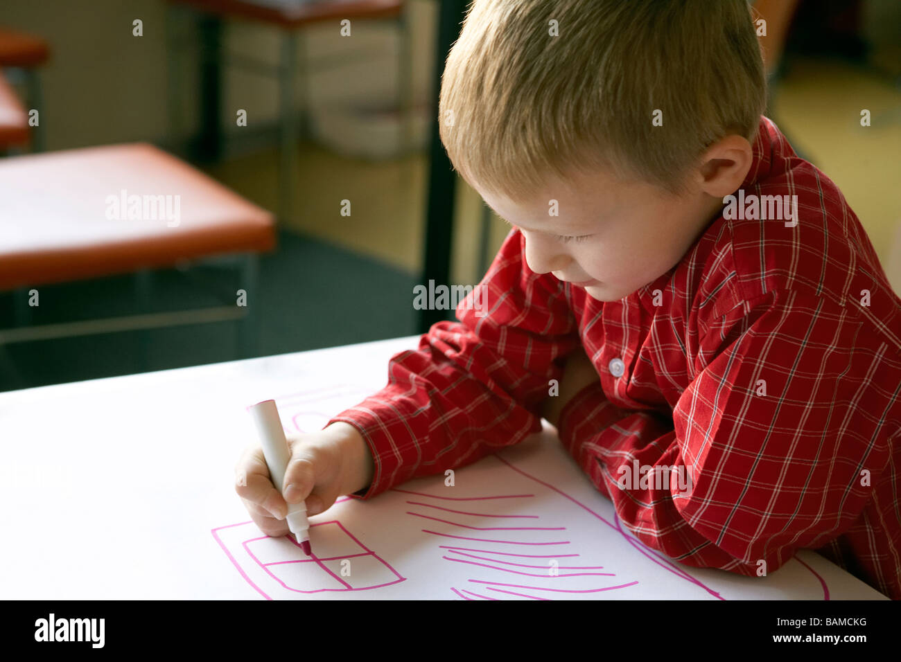 Boy Drawing Picture Stock Photo - Alamy
