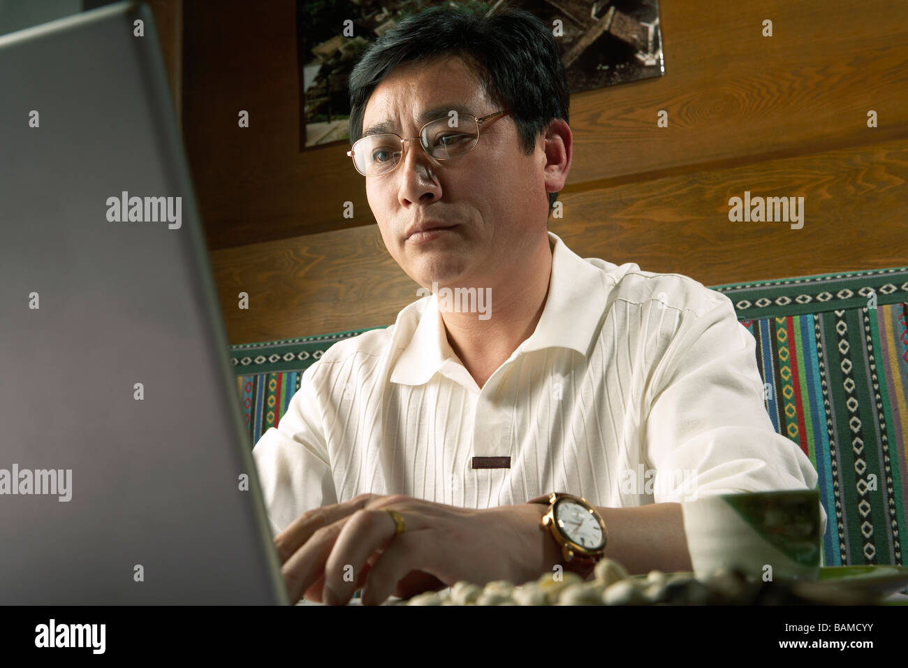 Man Typing On Laptop Stock Photo - Alamy