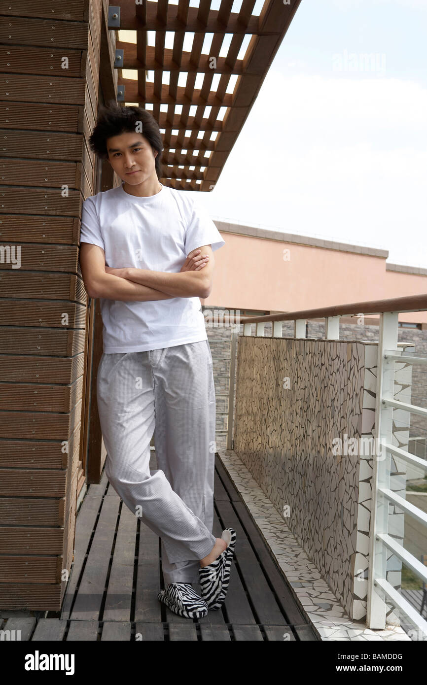 Man leaning on balcony full body hi-res stock photography and images ...
