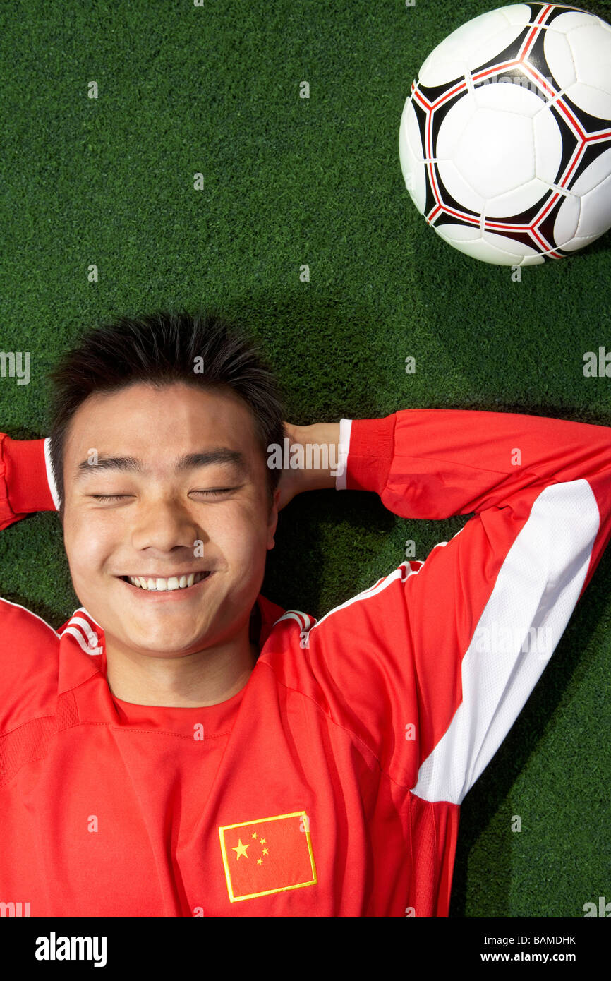 Soccer player lying down on hi-res stock photography and images - Alamy
