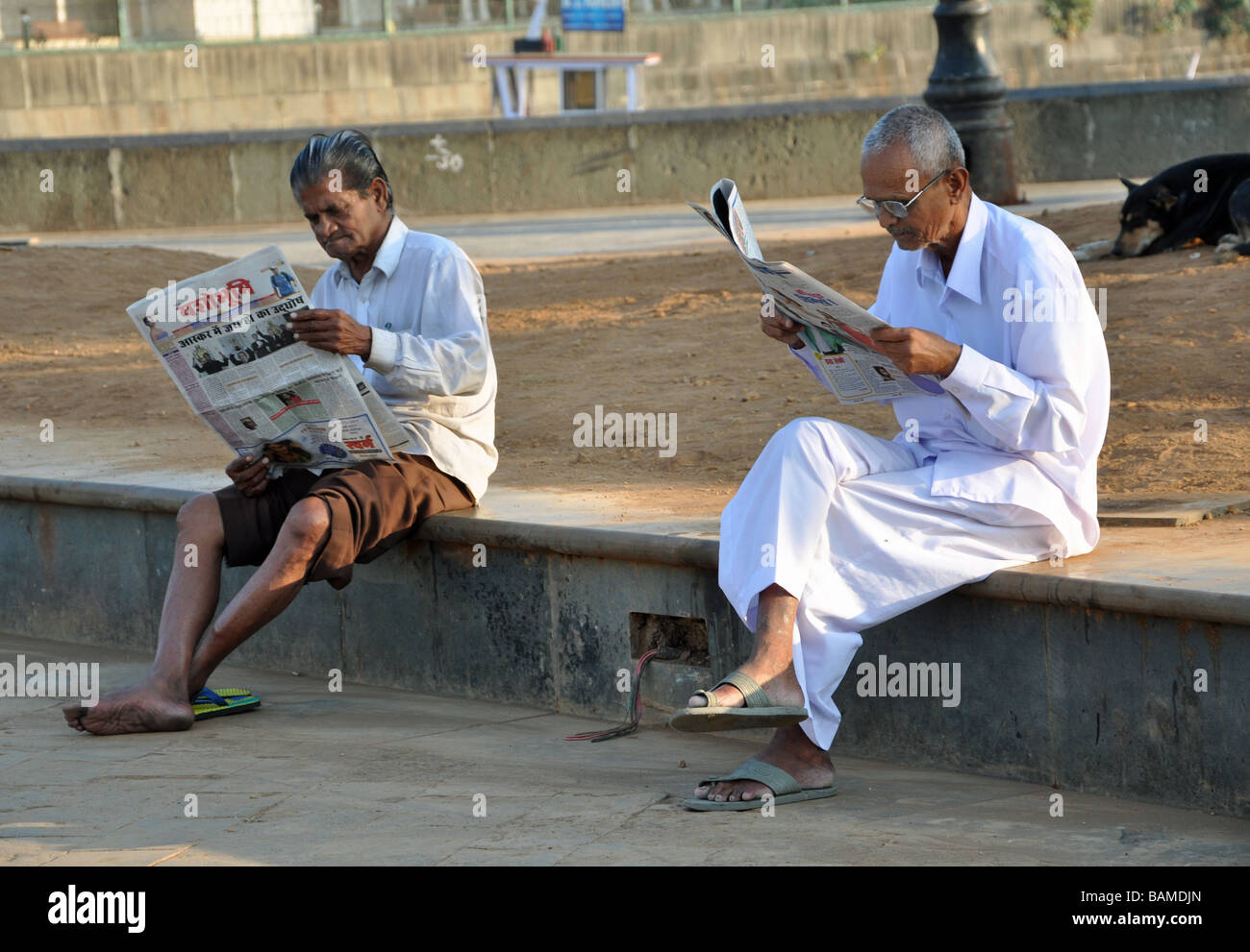Early Morning news at India Gate Mumbai Stock Photo - Alamy