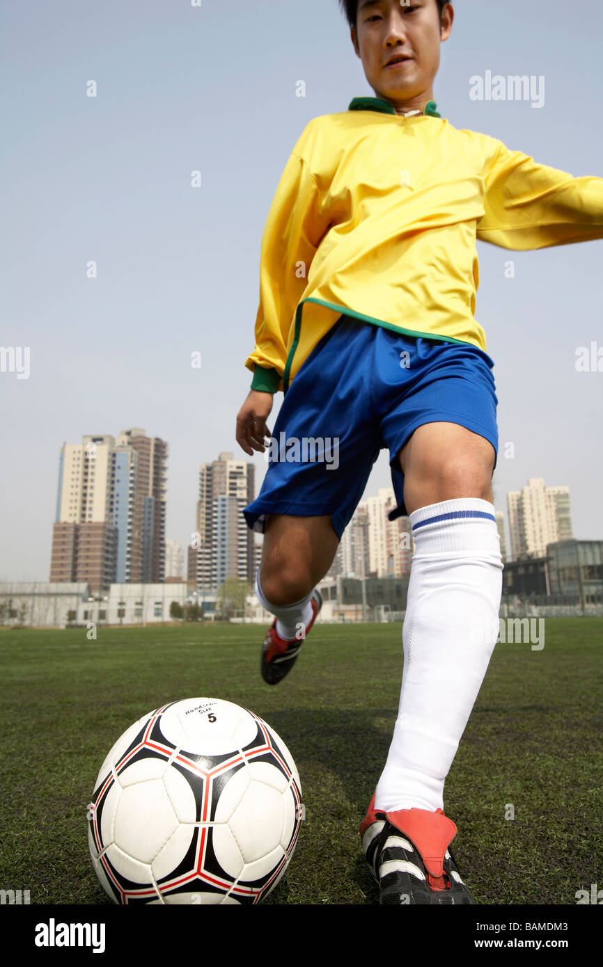 Man Playing Soccer Stock Photo - Alamy