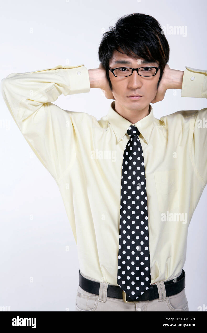 Man Putting Hands Over Ears Stock Photo - Alamy