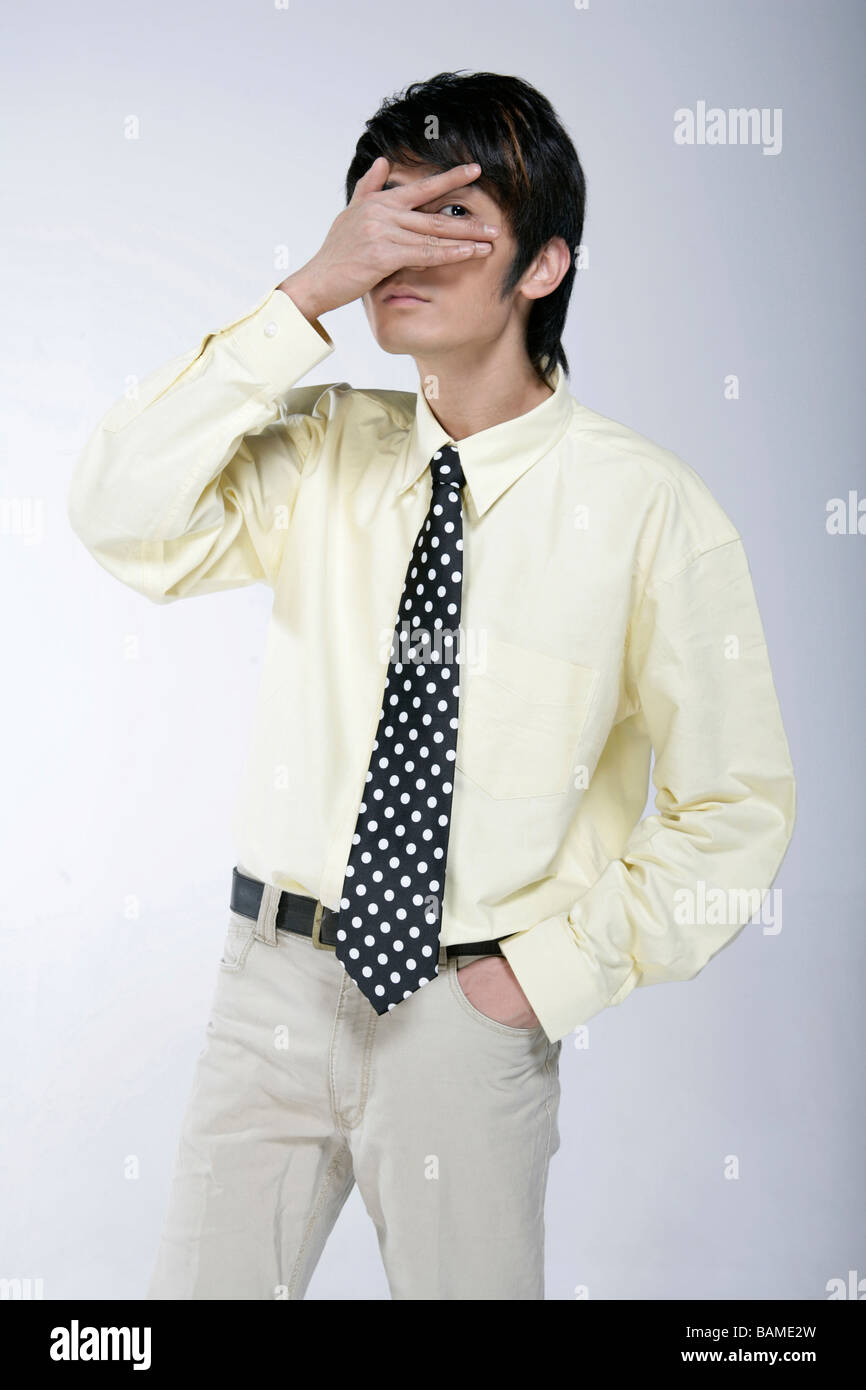 Man Putting Hand Over Eyes Stock Photo - Alamy