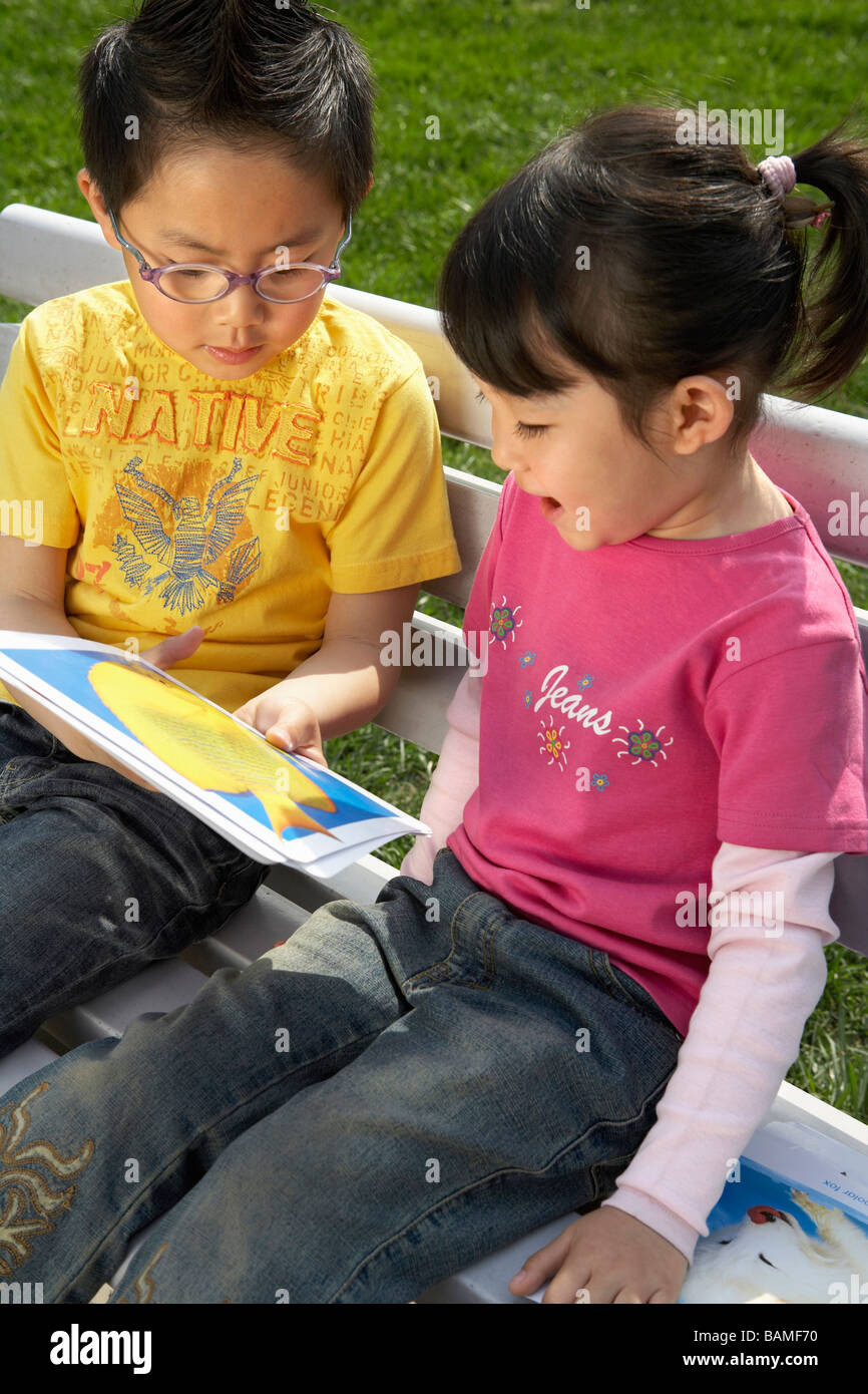 Children Reading Book Together Stock Photo - Alamy