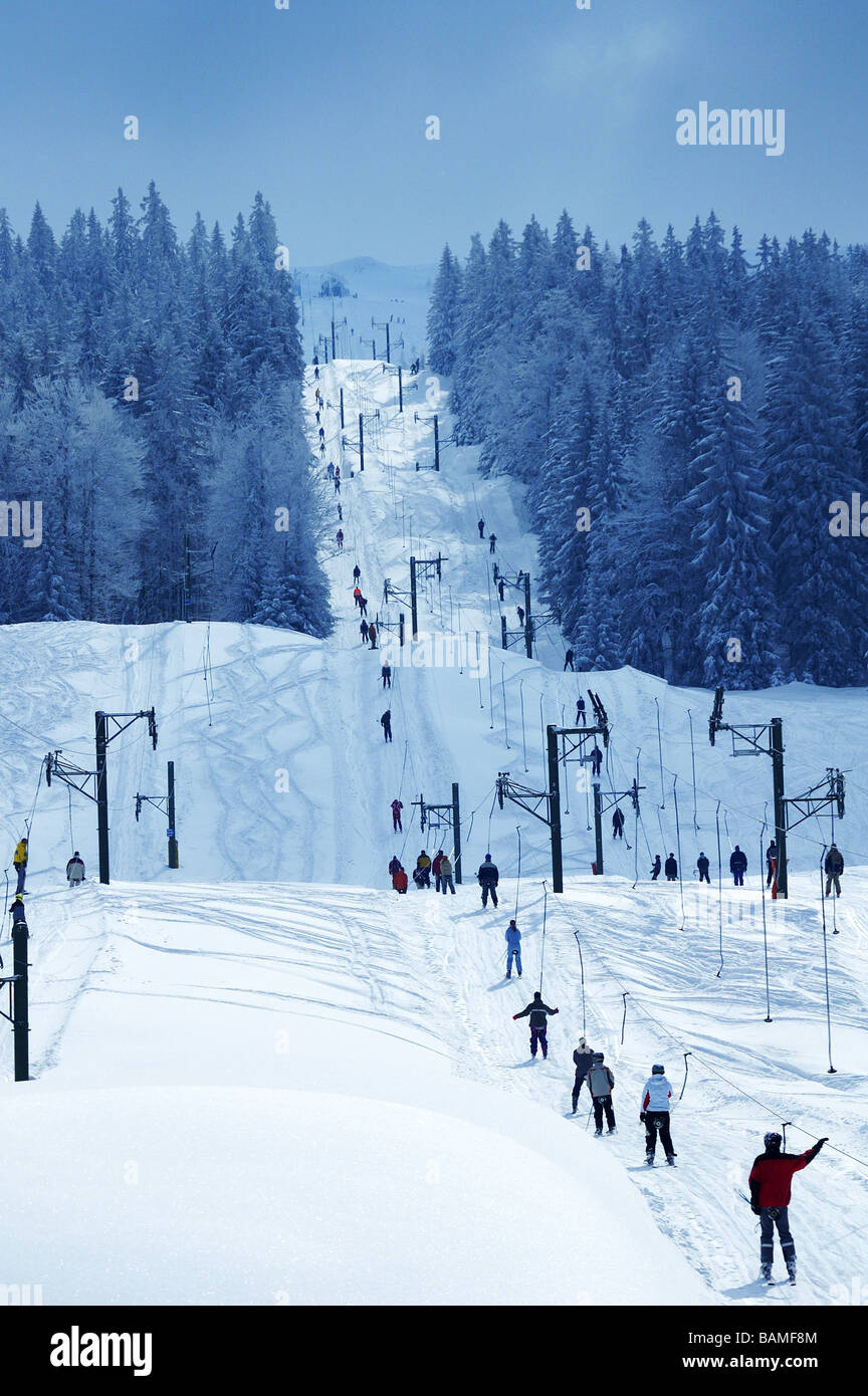 Ski lift on resort skiers hi-res stock photography and images - Alamy