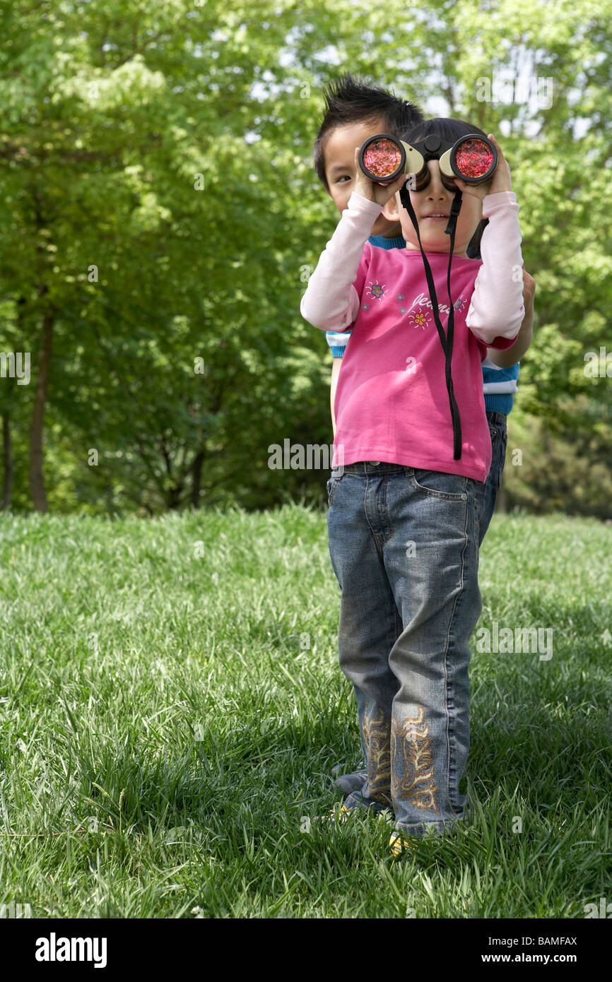 Children Playing With Binoculars Stock Photo - Alamy