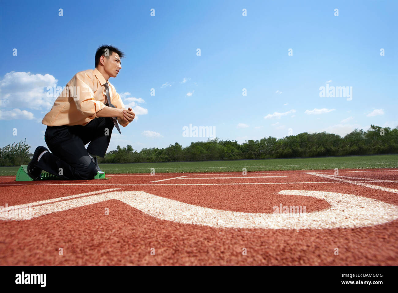 Businessman Running Track Stock Photo - Alamy