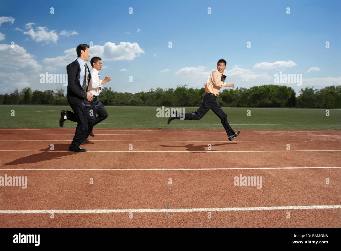 Man looking over shoulder running hi-res stock photography and images ...