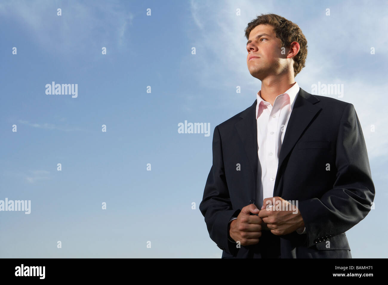 Business man stood looking serious hi-res stock photography and images ...