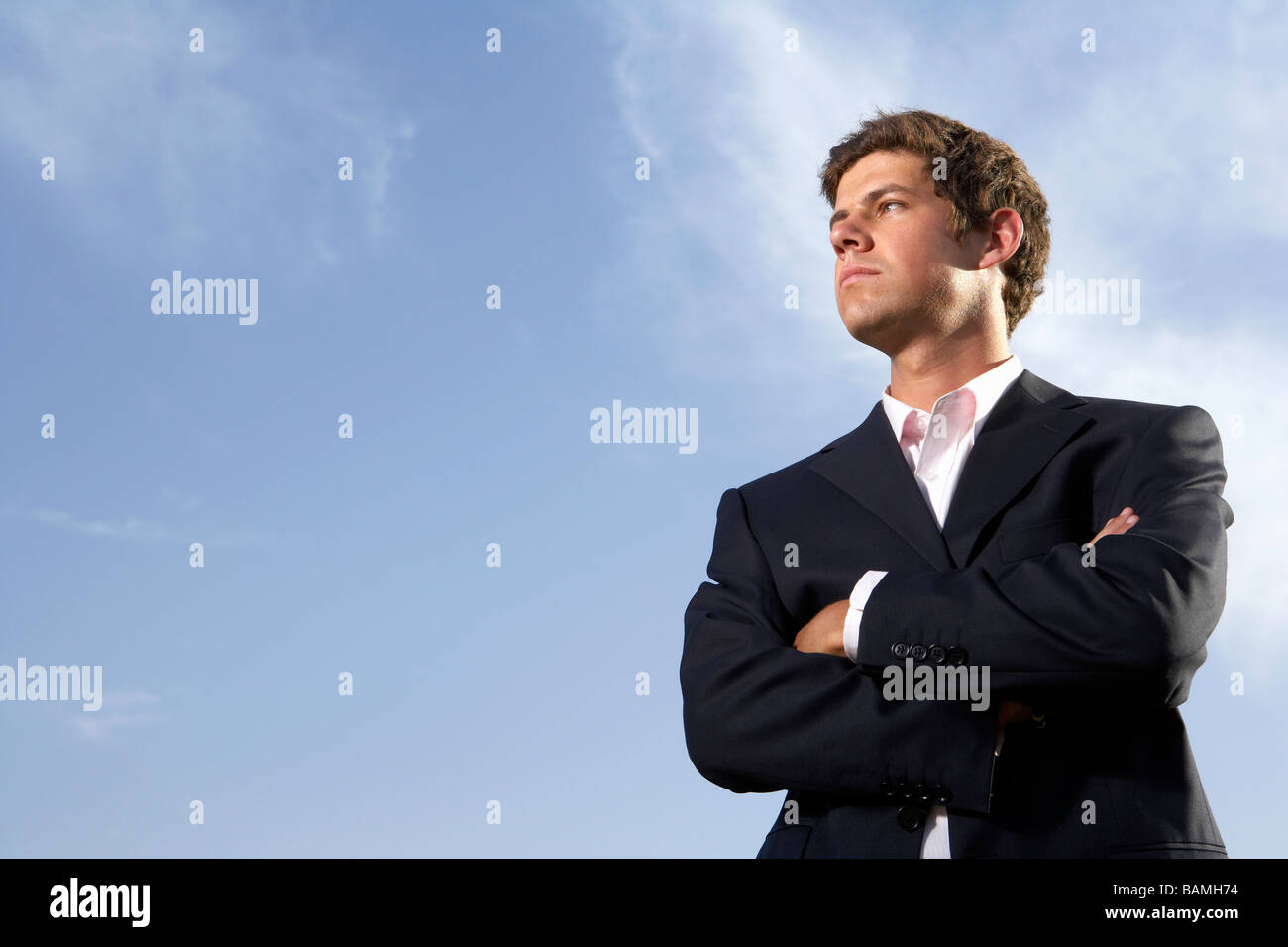 Man Standing In Field, Looking Into The Distance Stock Photo - Alamy