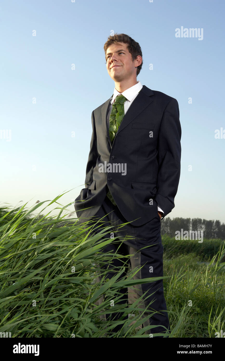 Man Standing In Field, Looking Into The Distance Stock Photo - Alamy