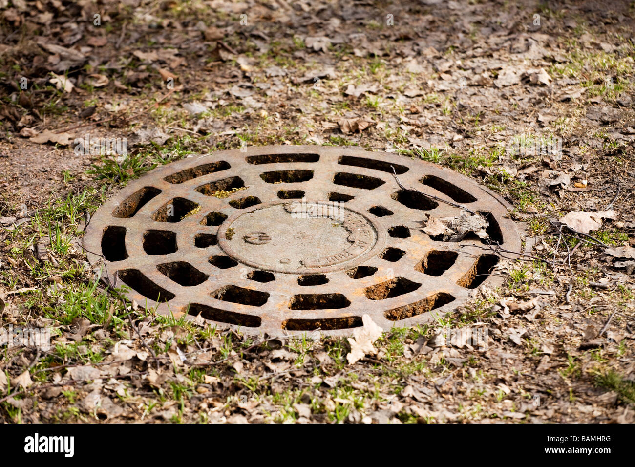 manhole of sewage system in park Stock Photo - Alamy