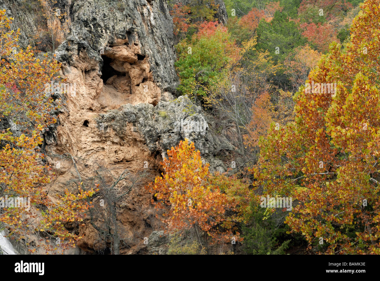 A cave opening high above a ravine at Turner Falls park near Davis ...