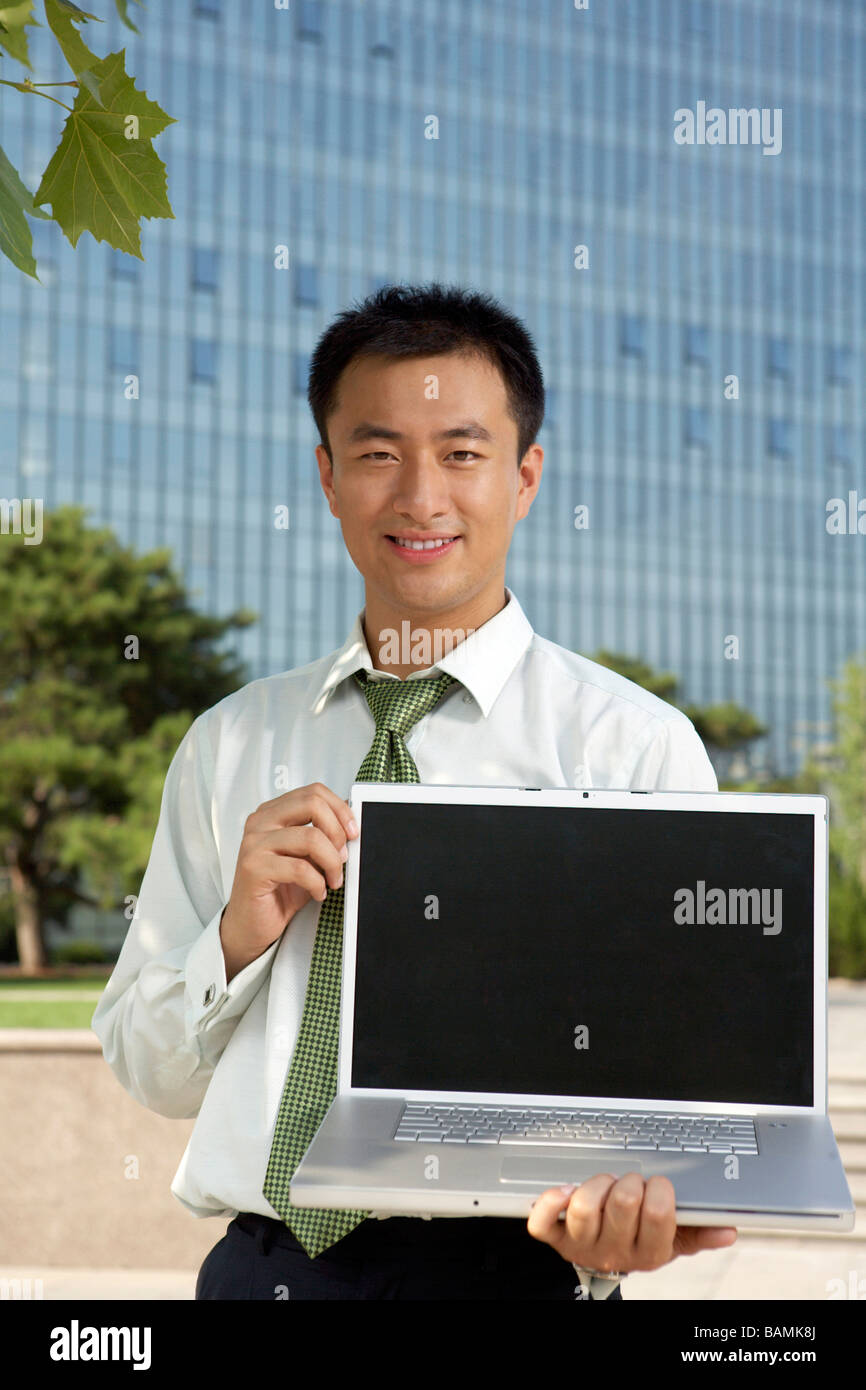 People holding computers tower hi-res stock photography and images - Alamy