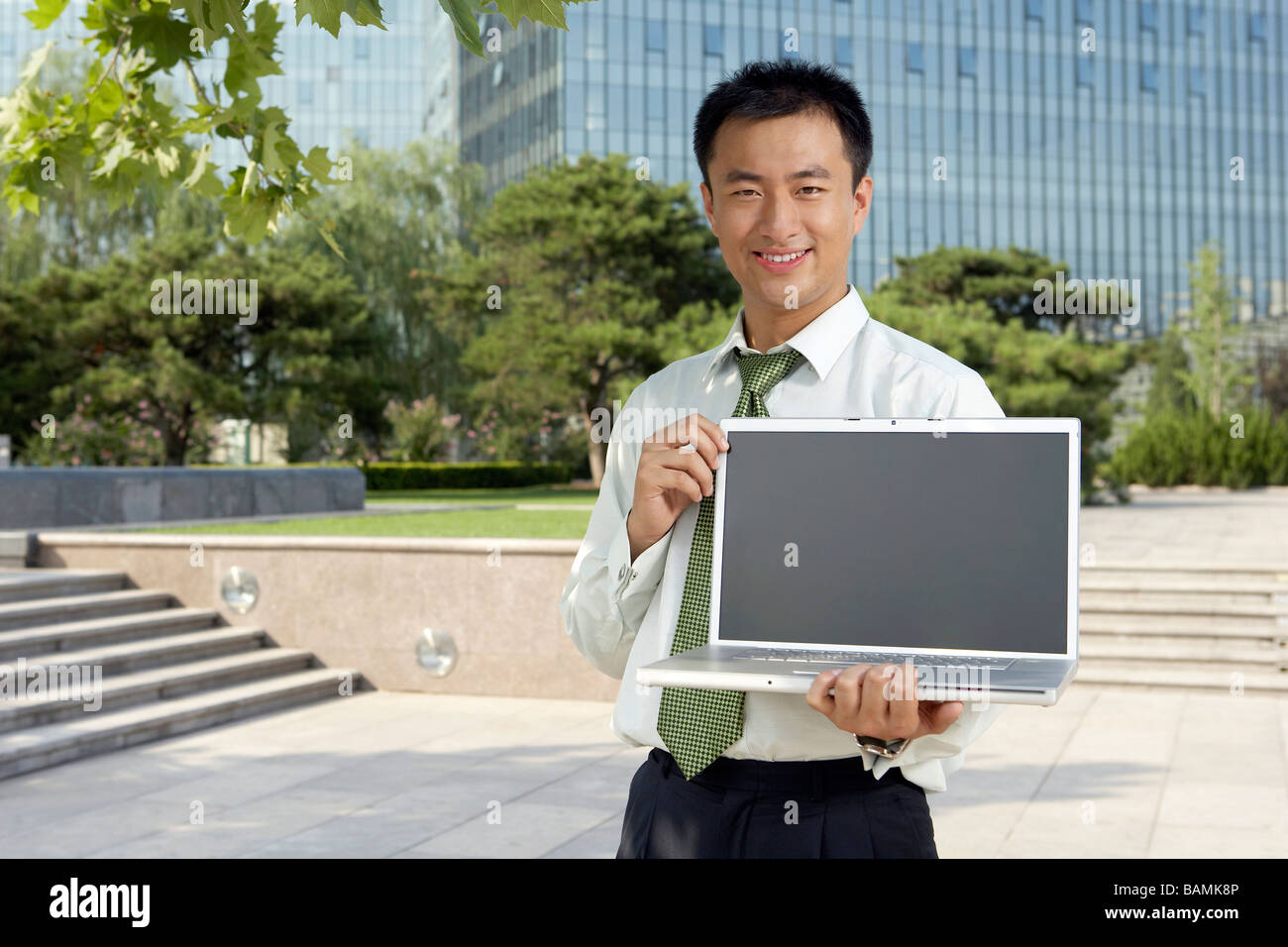 Portrait Of Businessman With A Computer Stock Photo - Alamy
