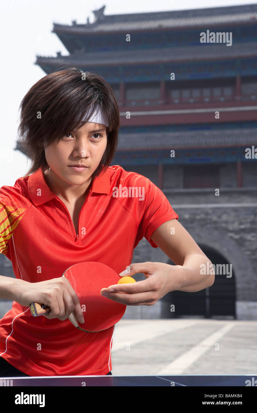 Portrait Of Ping Pong Player With Bat And Ball Stock Photo - Alamy