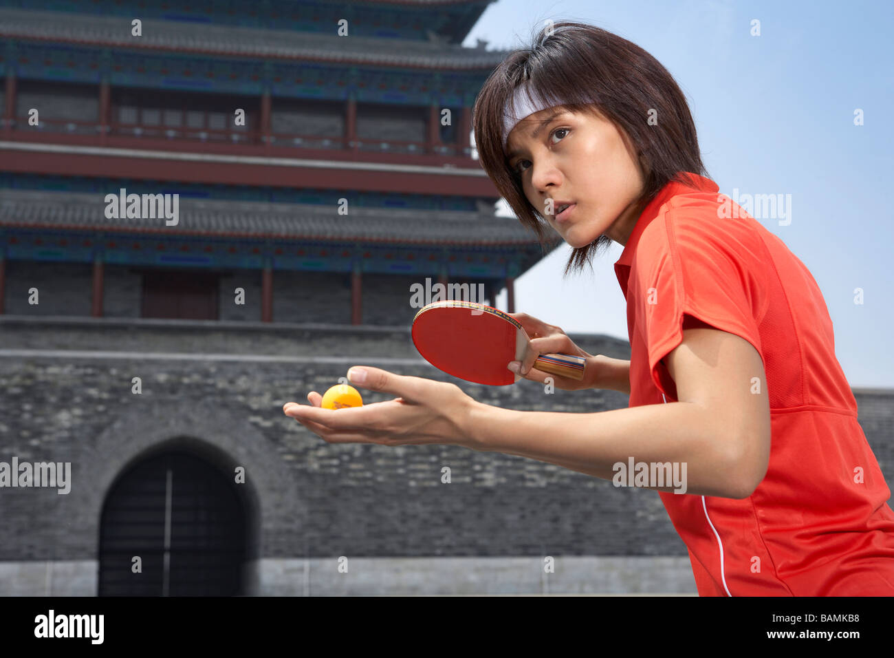 Portrait Of Ping Pong Player With Bat And Ball Stock Photo - Alamy