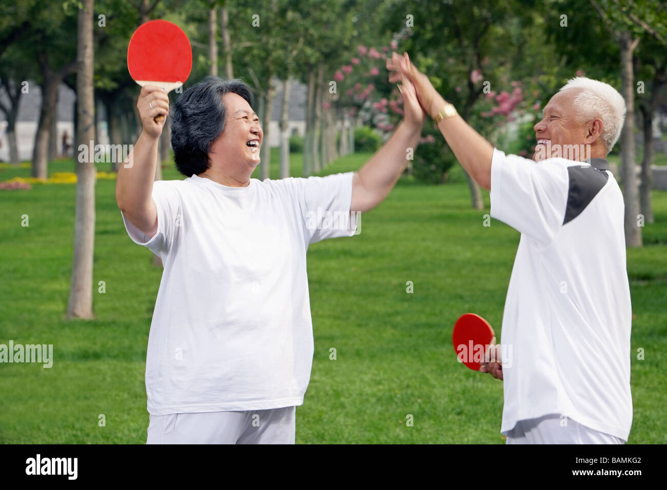 Senior chinese couple ping pong hi-res stock photography and images - Alamy