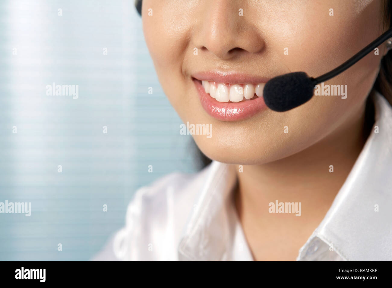 Woman Wearing A Headset Stock Photo - Alamy