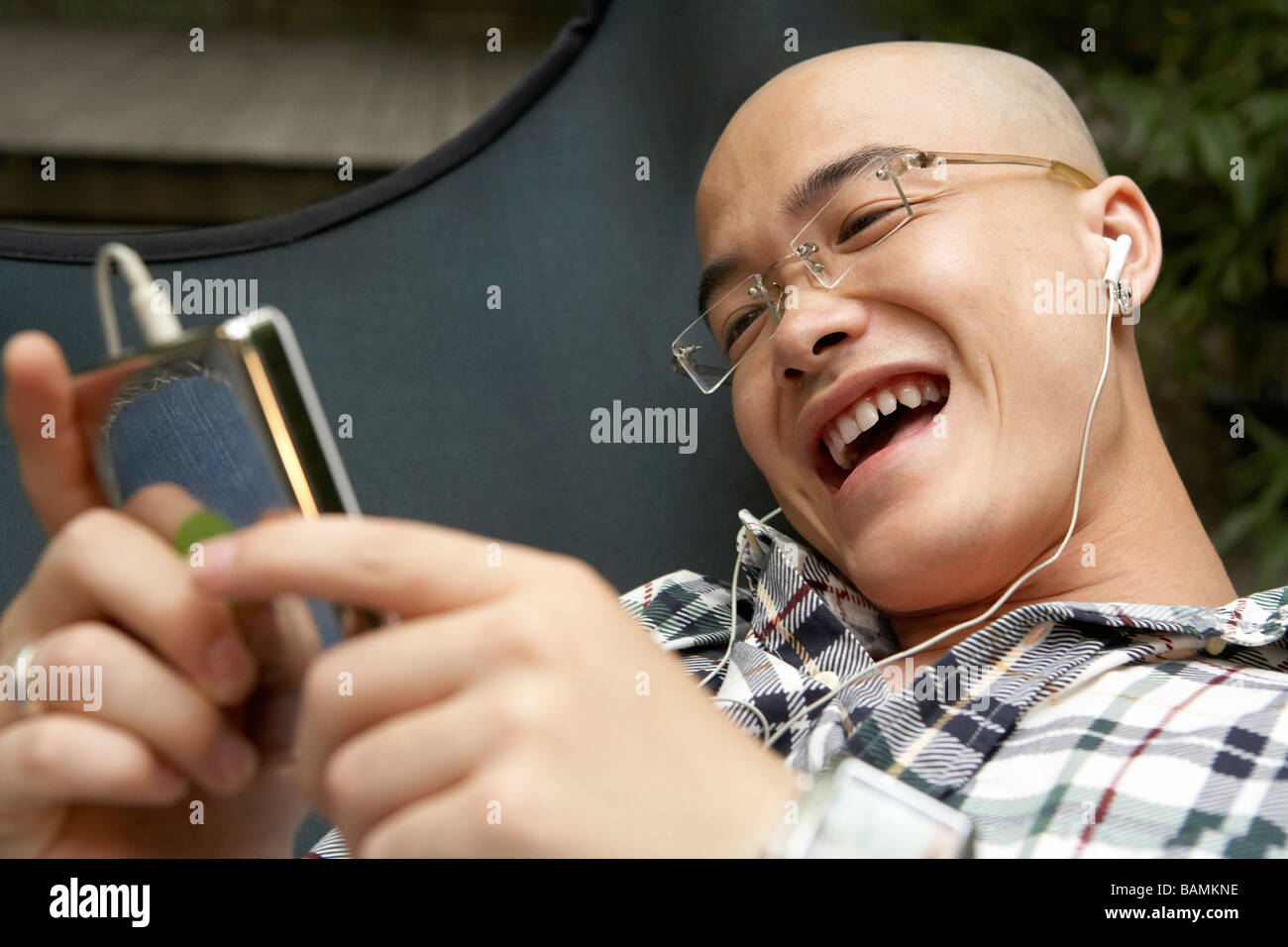 Man Listening To Mp3 Player Stock Photo - Alamy