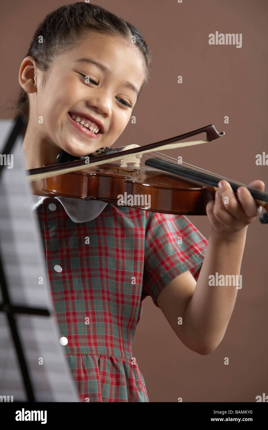 Girl Playing Violin Stock Photo - Alamy