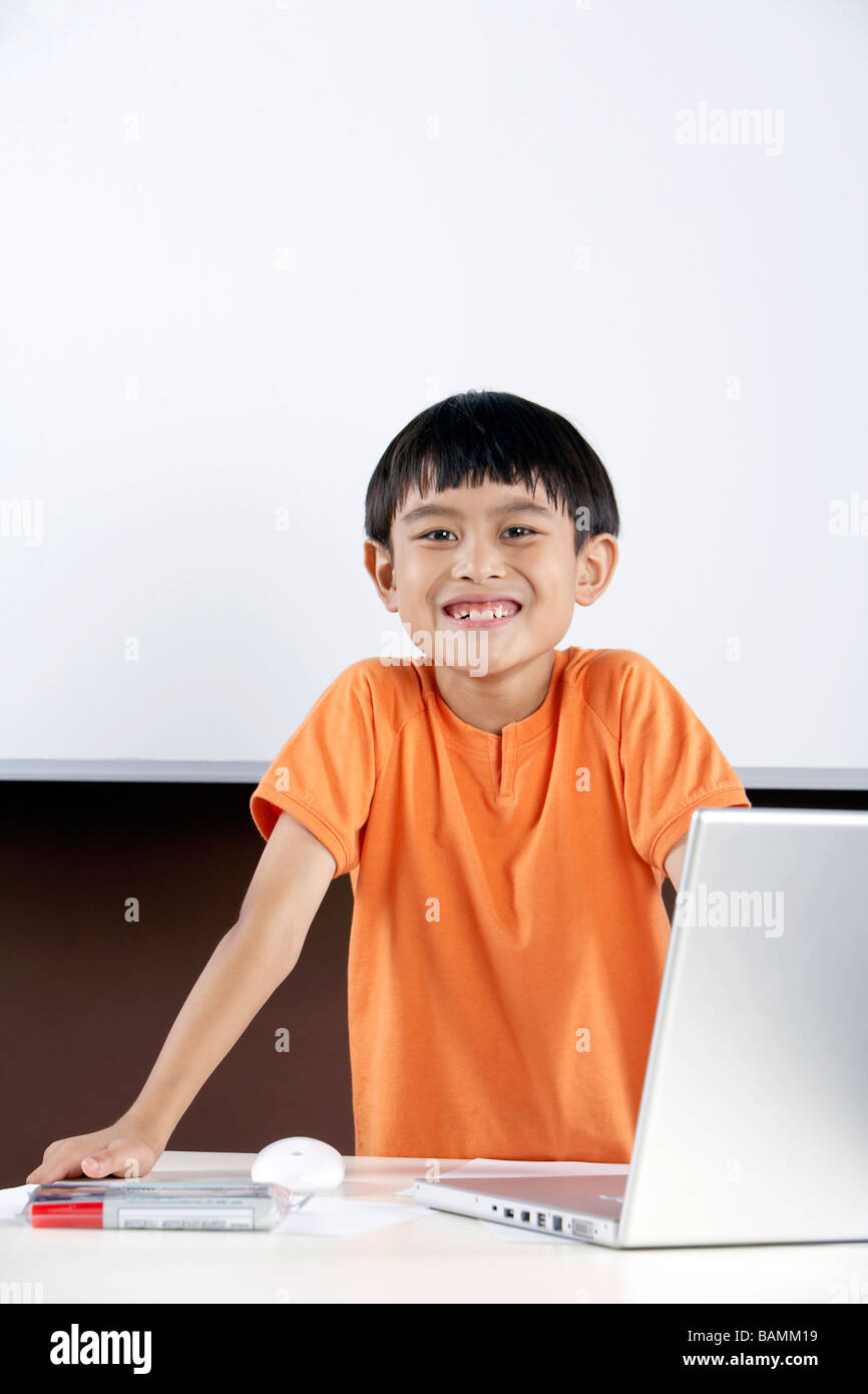 Young Boy Using Laptop Computer Stock Photo - Alamy
