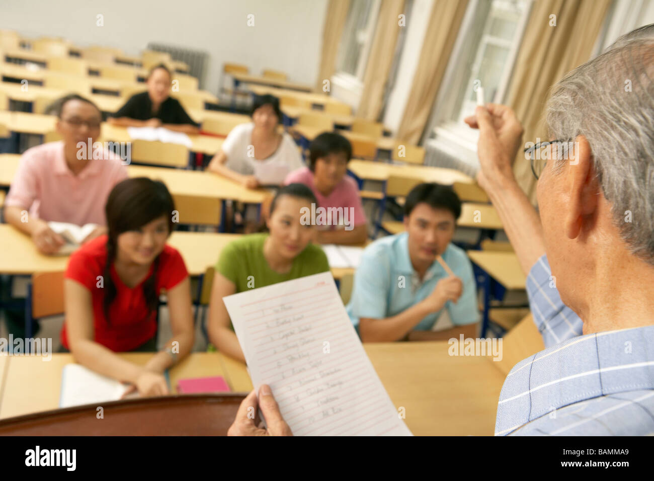 Woman lecturing to men hi-res stock photography and images - Alamy