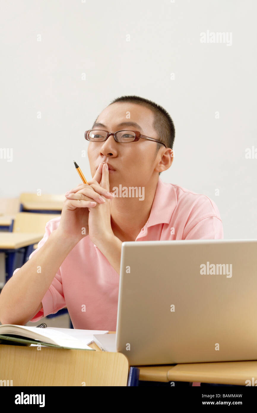 Student Making Notes In A Book Stock Photo - Alamy