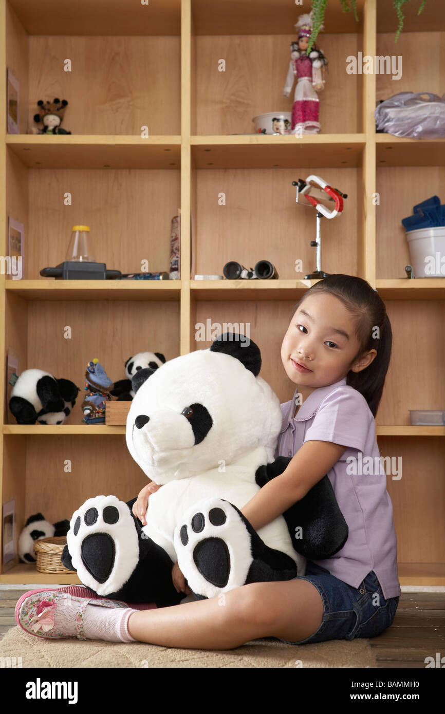 Portrait Of Young Girl With A Stuffed Toy Panda Stock Photo - Alamy
