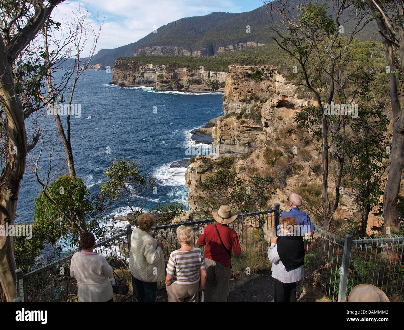 VISITORS AND TOURISTS AT LOOKOUT NEAR TASMANS ARCH WITH VIEW ACROSS ...