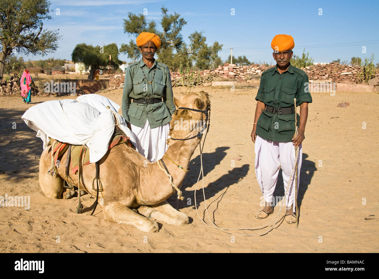 Camel drivers from Osian Camel Camp standing beside a camel, Osian ...