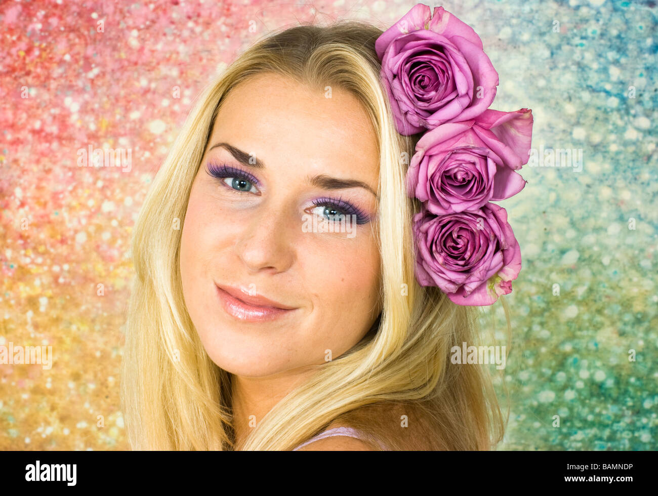 Model girl with roses in the studio Stock Photo - Alamy