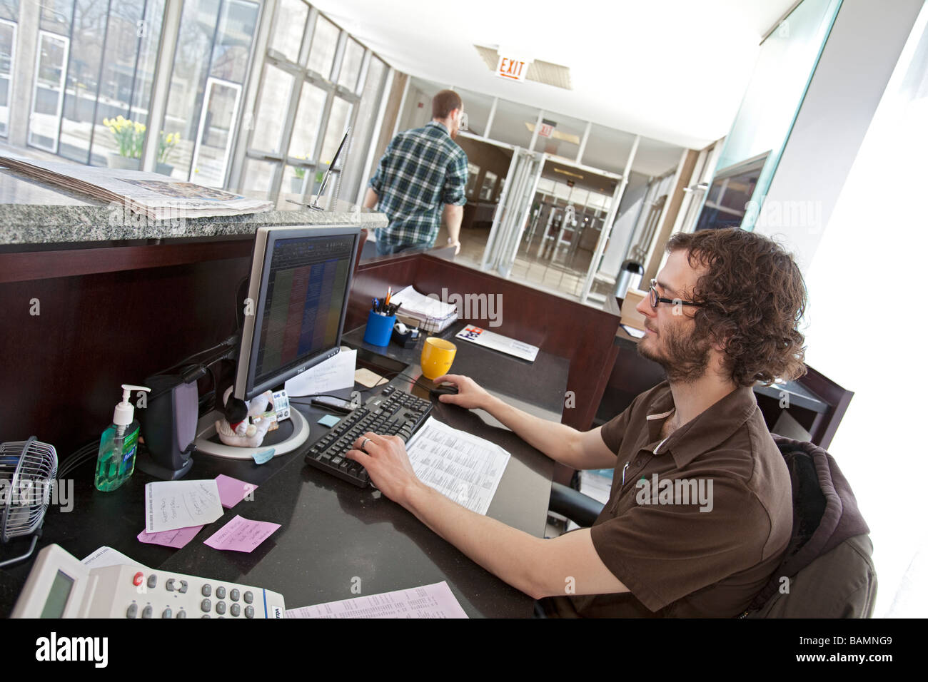 Receptionist hi-res stock photography and images - Alamy