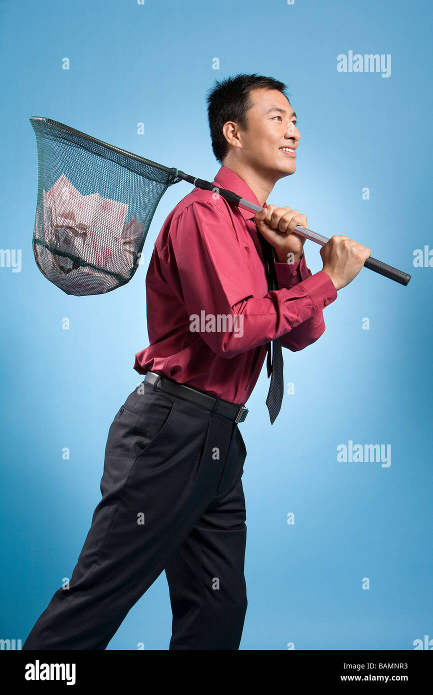 Men carrying nets hi-res stock photography and images - Alamy
