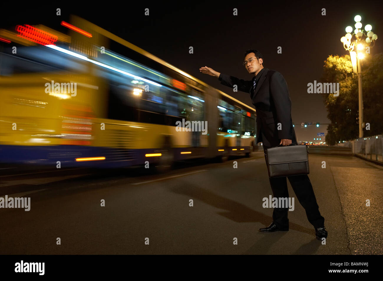 Hailing bus hi-res stock photography and images - Alamy