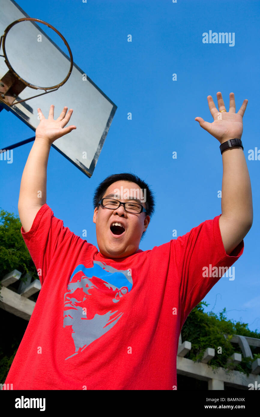 Teenage Boy Cheering Stock Photo - Alamy