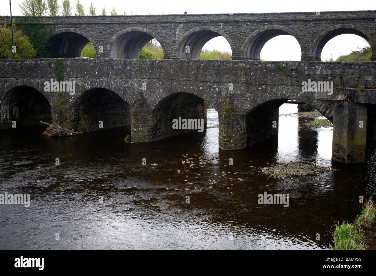 road bridge and former railway viaduct over the river maine in ...