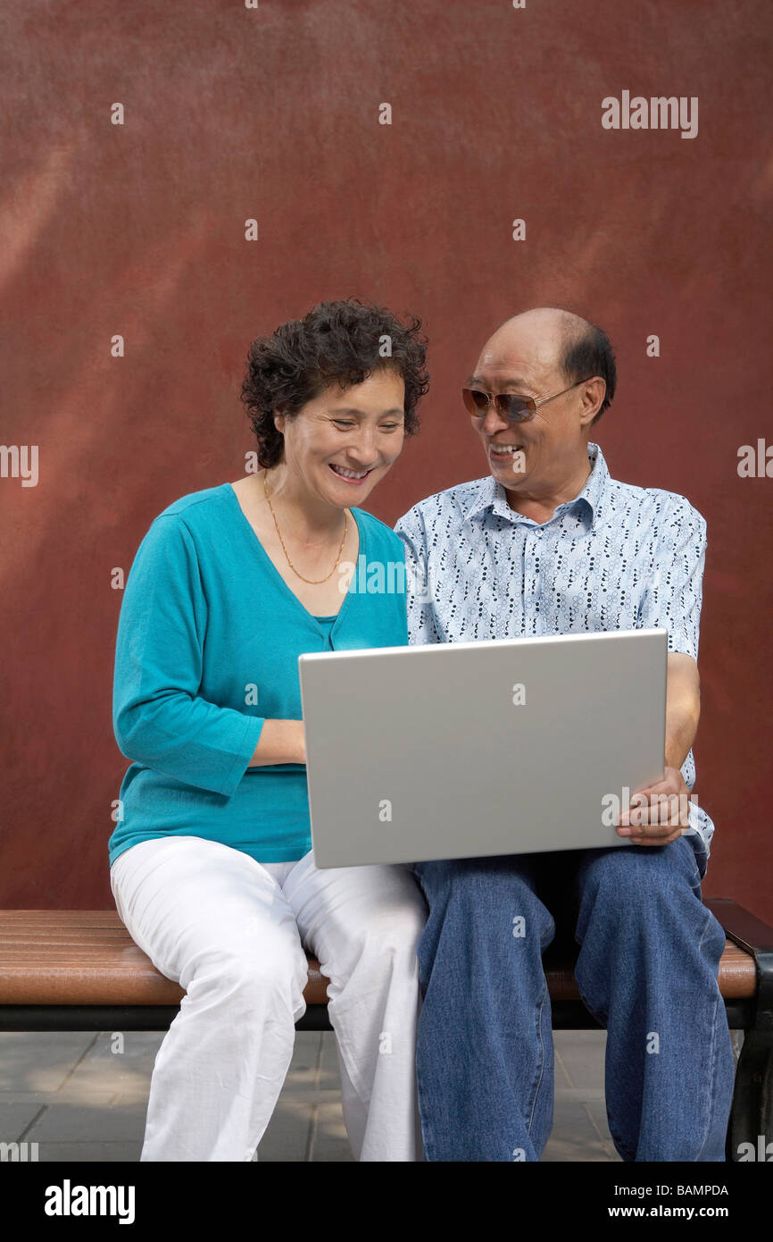Chinese old lady happy laptop hi-res stock photography and images - Alamy
