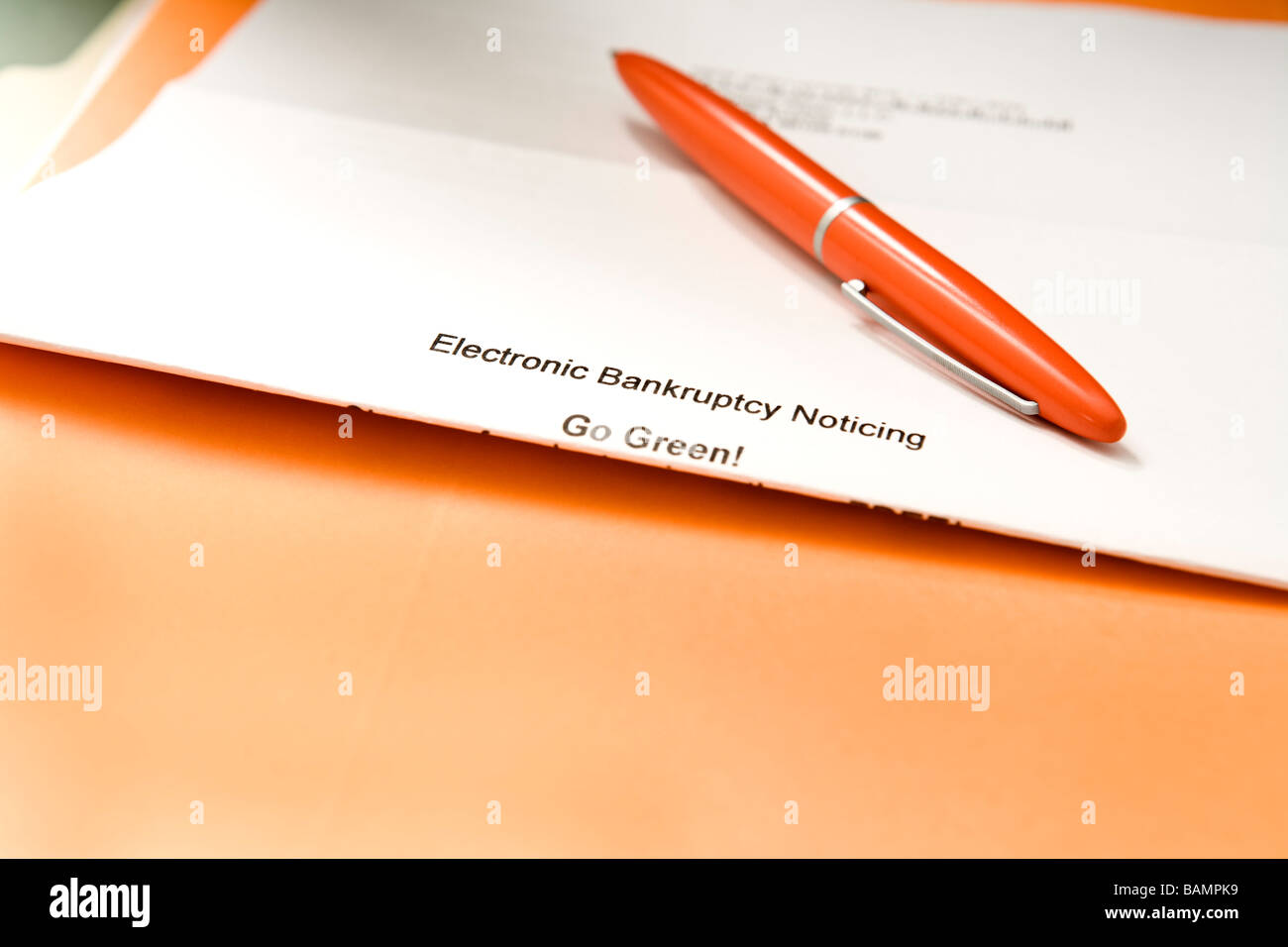 Electronic bankruptcy notice and pen on a file folder Stock Photo - Alamy