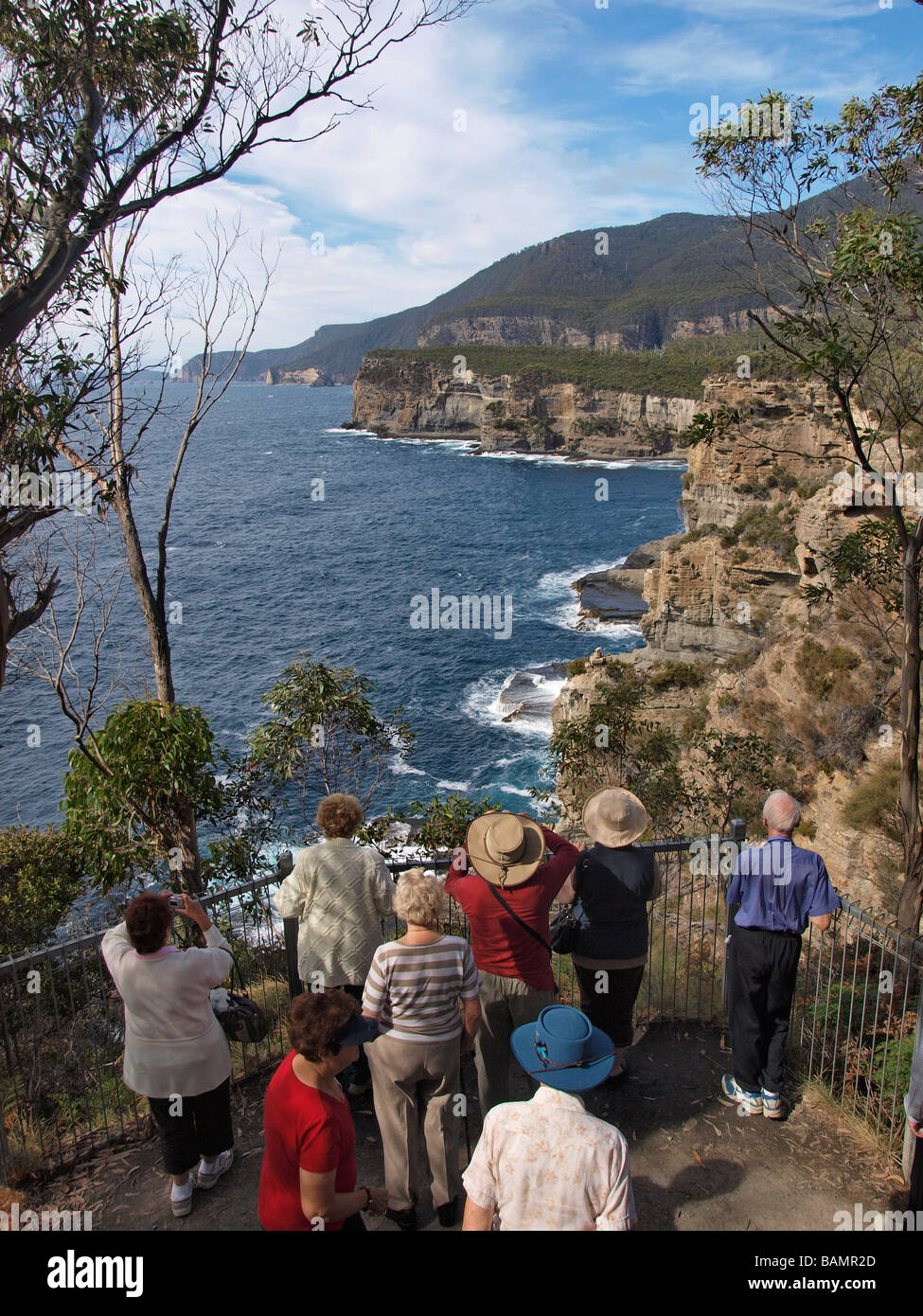 VISITORS AND TOURISTS AT LOOKOUT NEAR TASMANS ARCH WITH VIEW ACROSS ...
