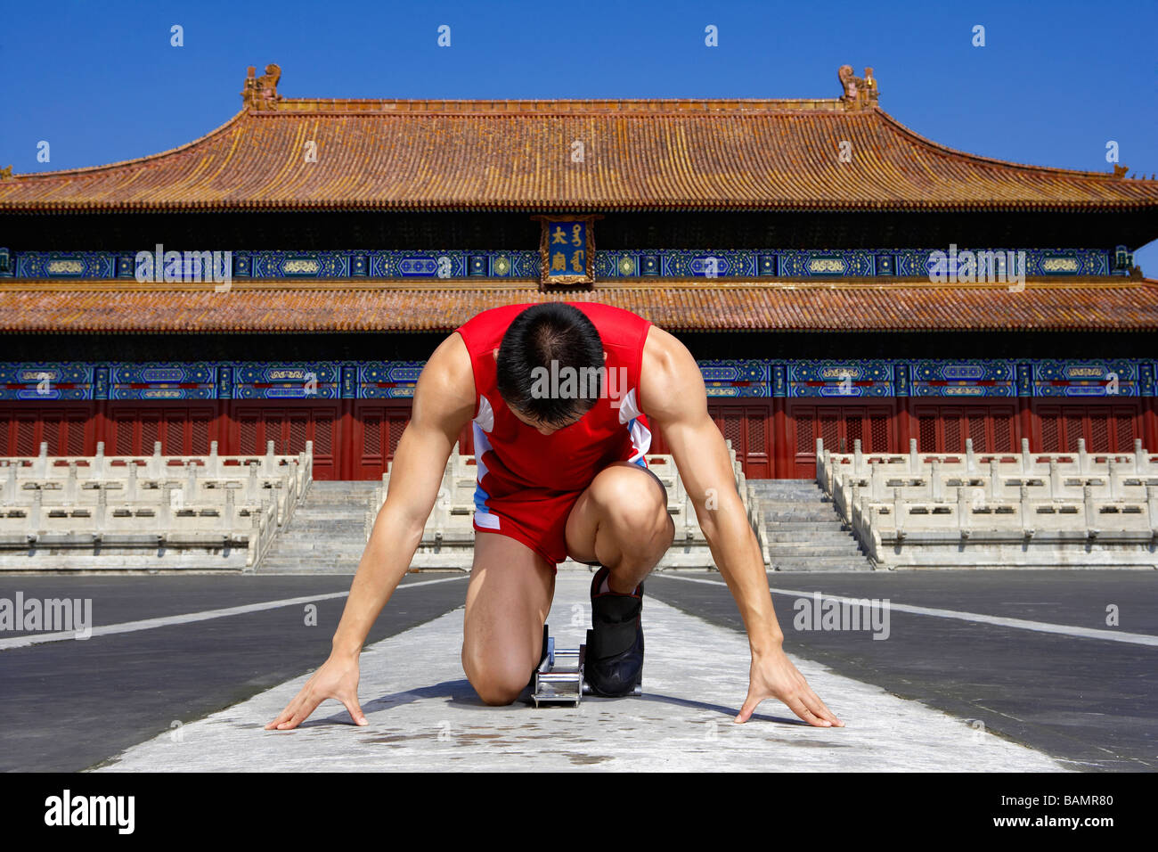 Portrait Of Athlete In Front Of Temple Stock Photo - Alamy