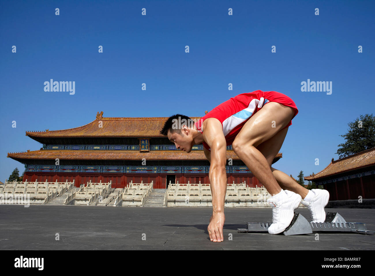 Portrait Of Athlete In Front Of Temple Stock Photo - Alamy