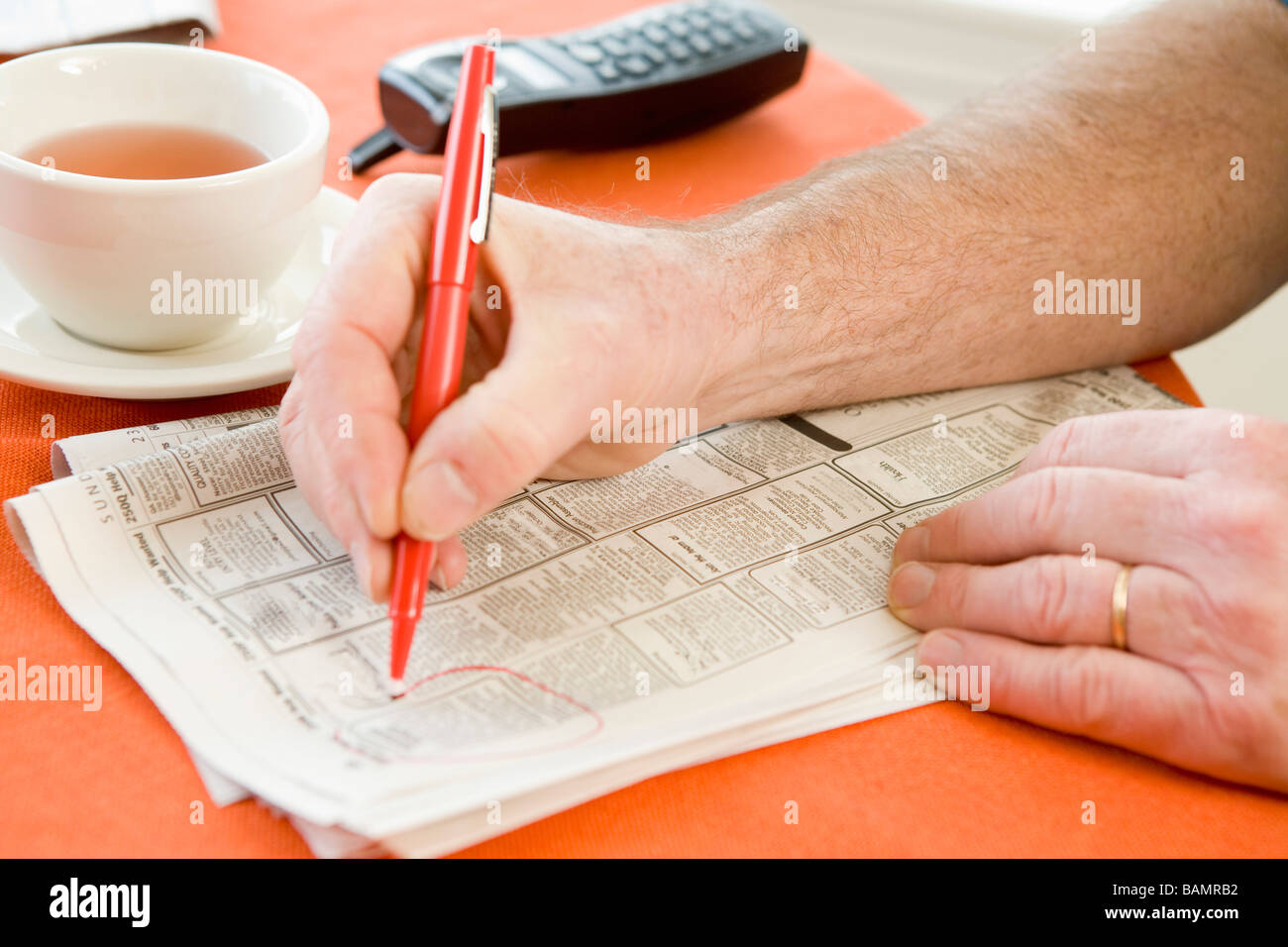 Man newspaper ads hi-res stock photography and images - Alamy